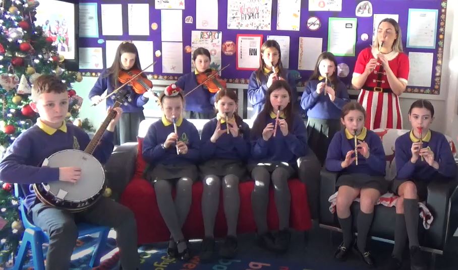 Holy Trinity Trad band play a tune for Christmas.